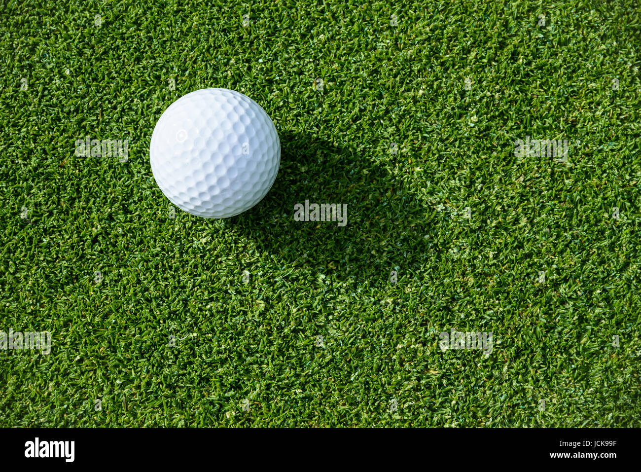 Top view of golf ball on a putting green Stock Photo - Alamy