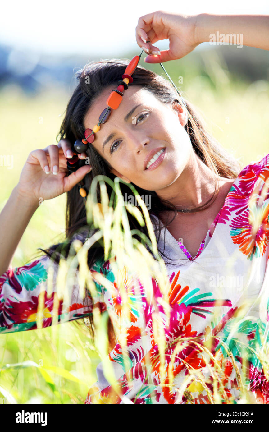 Beautiful woman in country field Stock Photo - Alamy