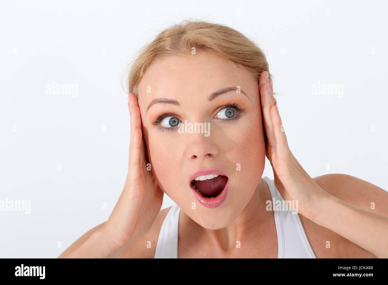 Portrait of beautiful woman with surprised look Stock Photo - Alamy