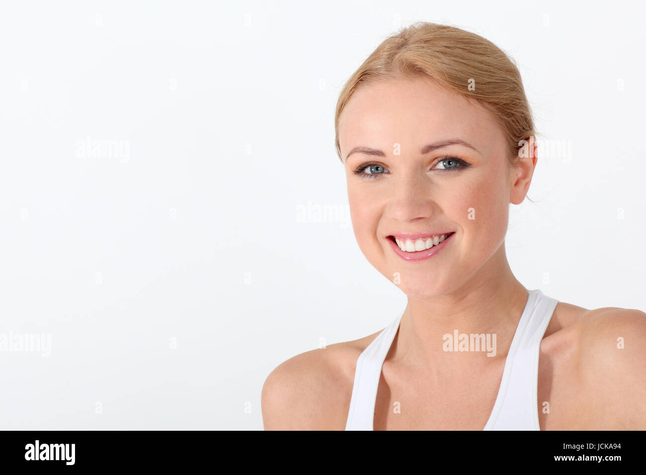 Portrait of beautiful smiling woman on white background Stock Photo - Alamy