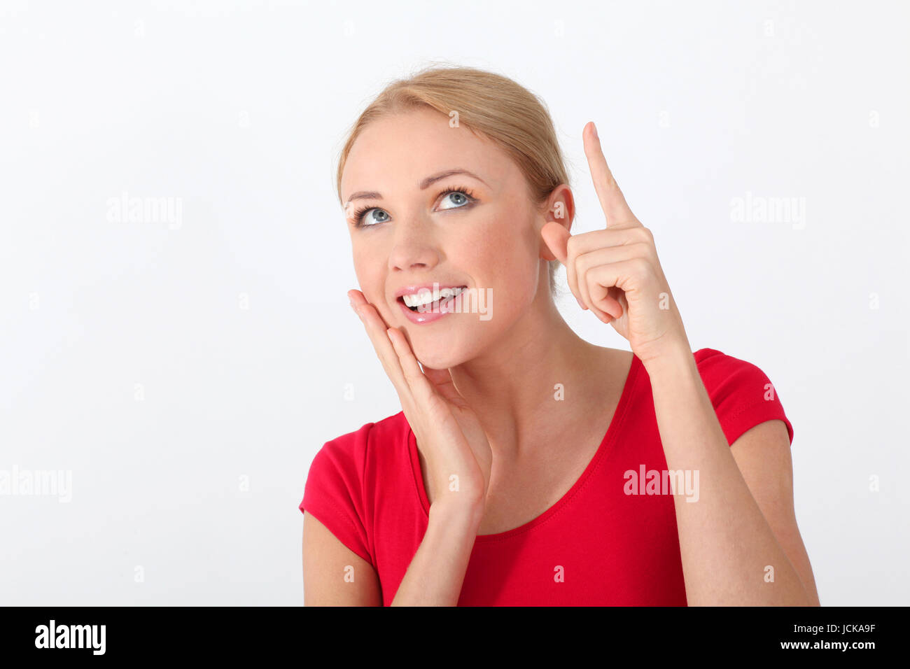 Portrait of beautiful blond woman with interrogative look Stock Photo ...