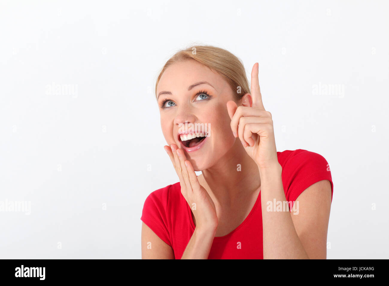 Portrait of beautiful blond woman with interrogative look Stock Photo ...