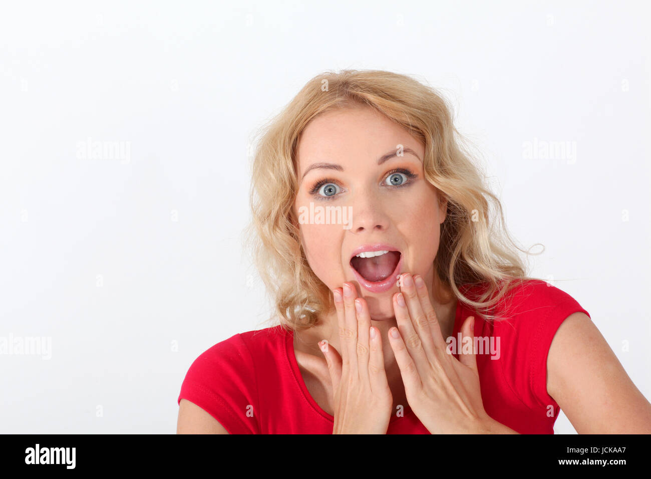 Shocked casual woman feeling surprised hi-res stock photography and ...