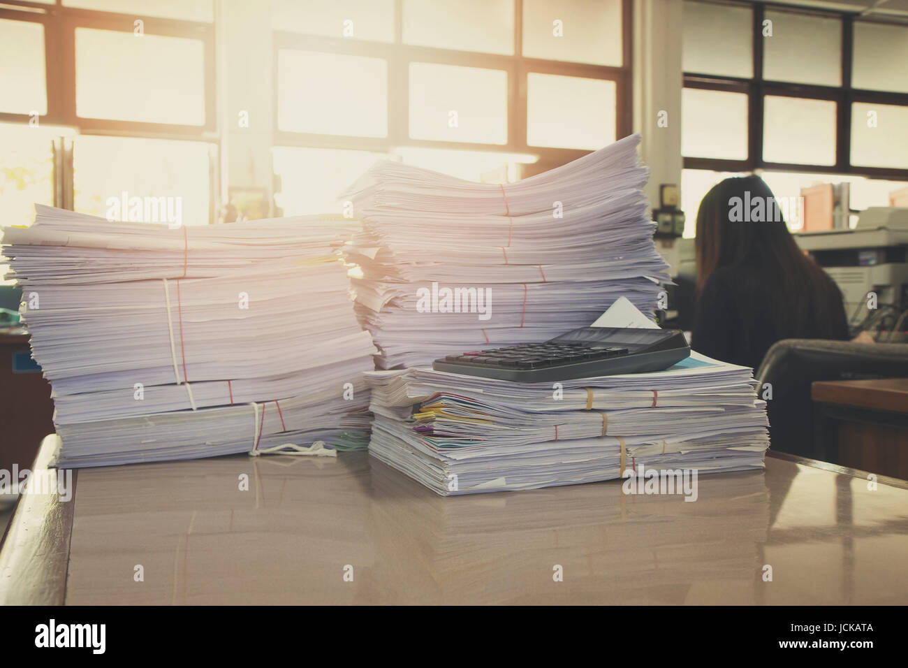 Pile of unfinished documents on office desk, Stack of business paper ...