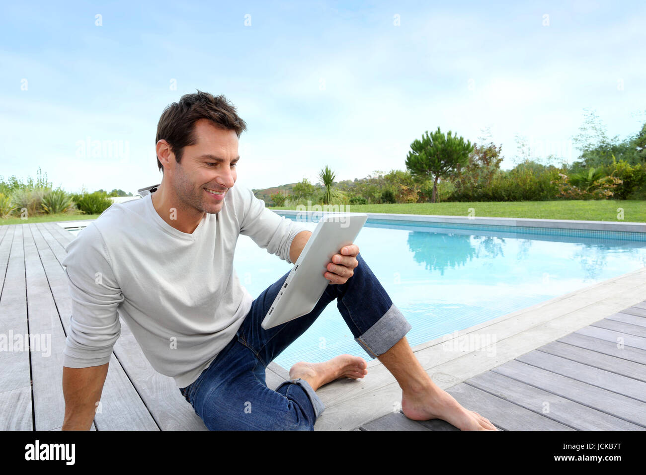 Touchpad swimming hi-res stock photography and images - Alamy