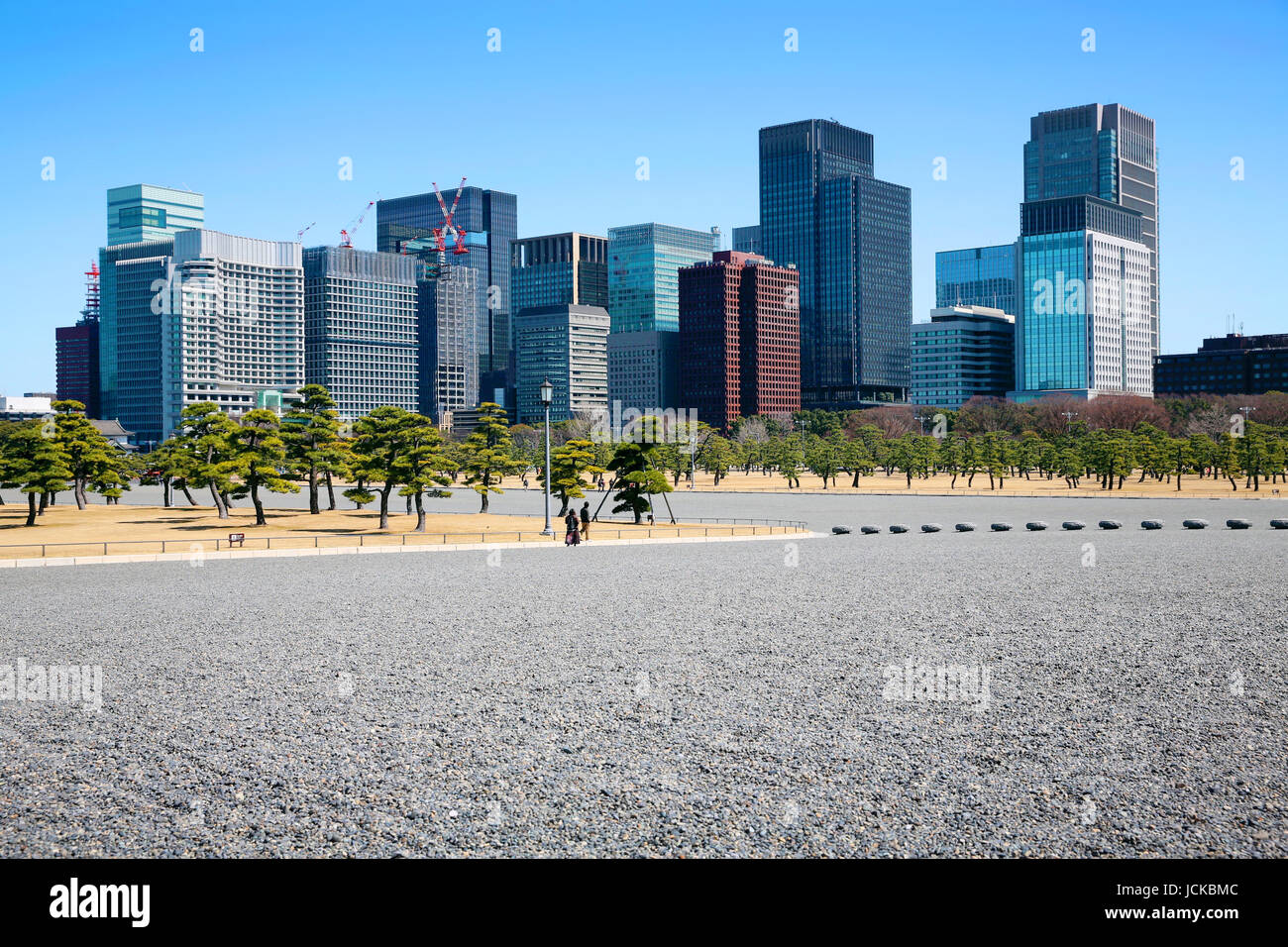Stone square garden with modern office building in Japan Stock Photo ...