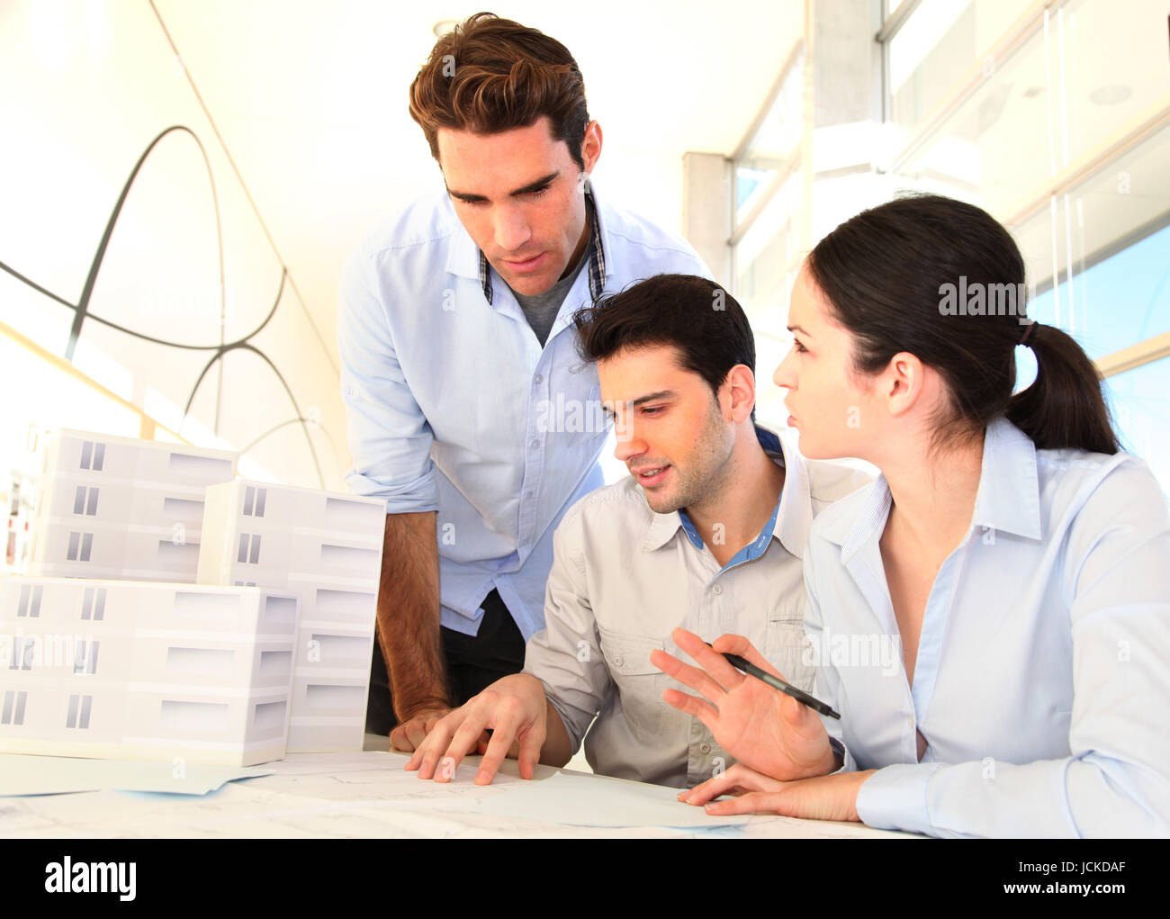 Young architects in business meeting Stock Photo - Alamy