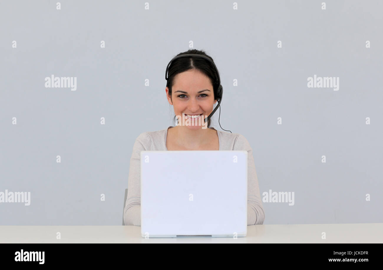 Customer service woman on white background Stock Photo - Alamy