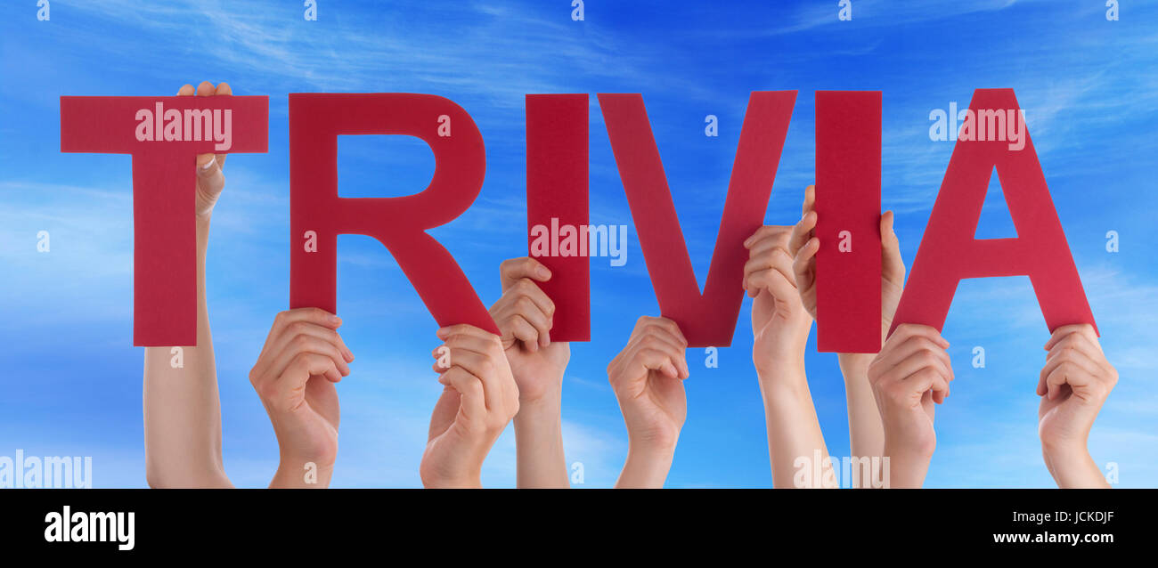Many People Holding the Red Word Trivia in the Sky Stock Photo - Alamy