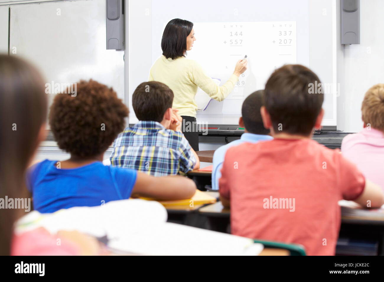 Child using whiteboard hi-res stock photography and images - Alamy