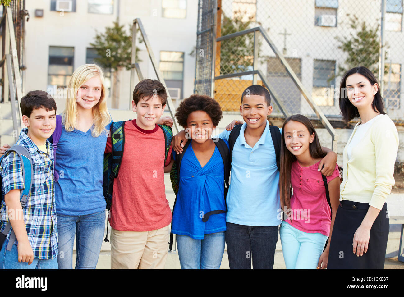 Group of Elementary Pupils Outside Classroom With Teacher Stock Photo ...