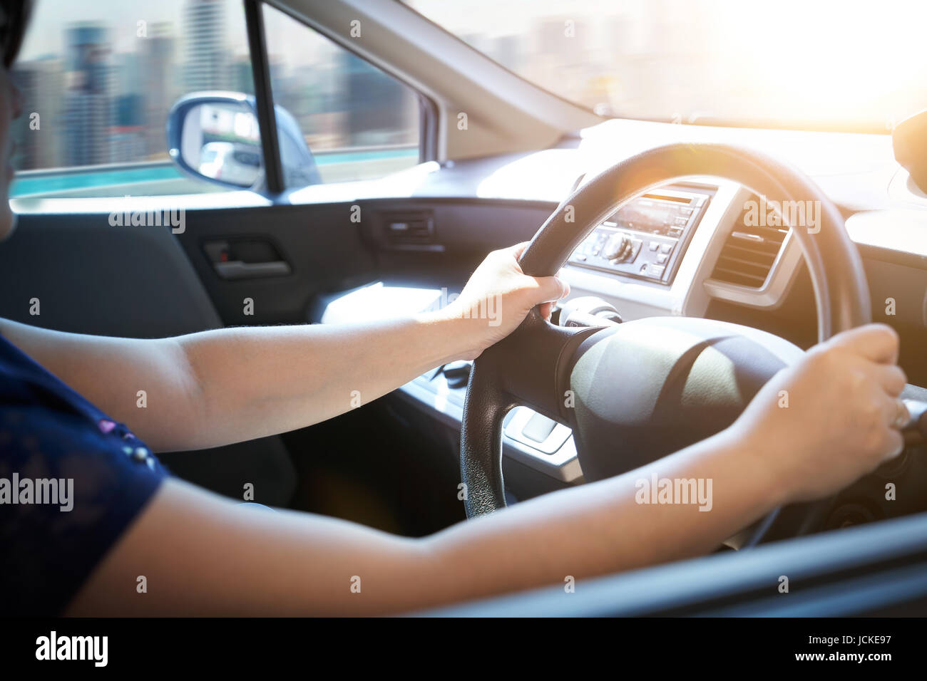 Woman driver driving car with confident and concentrated Stock Photo ...