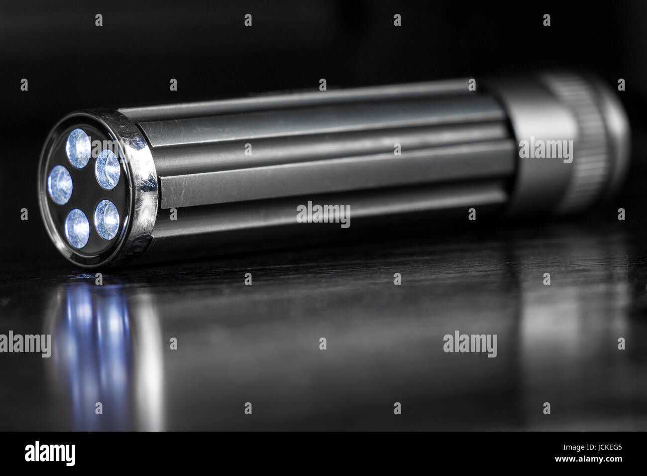 Handheld LED Flashlight closeup Stock Photo - Alamy