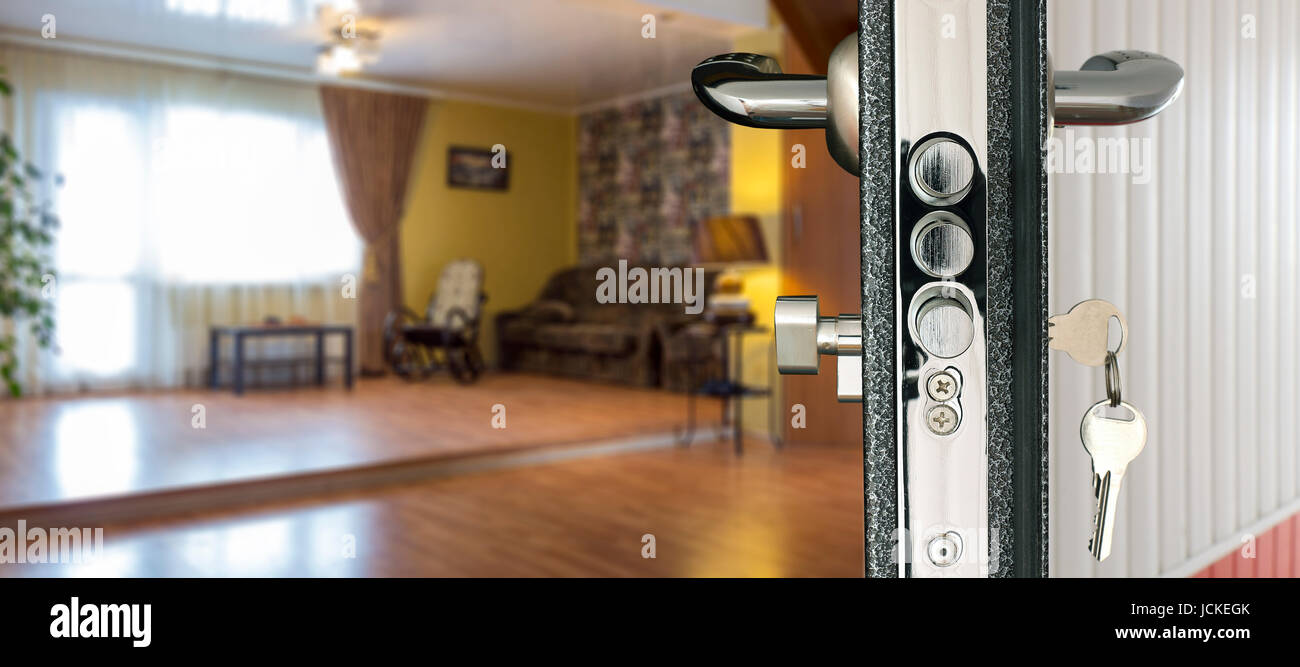 View living room through open door Stock Photo - Alamy