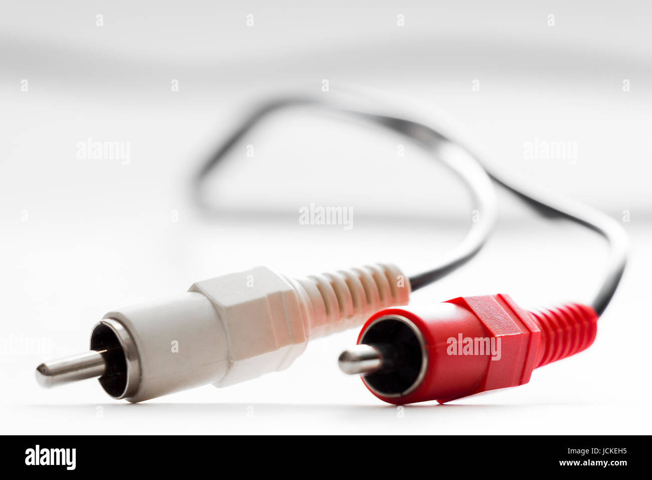 RCA cable with connectors on a white background Stock Photo - Alamy