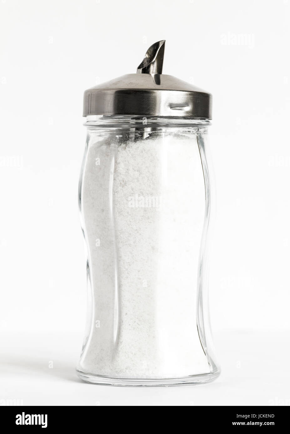 Kitchen glass salt shaker on a white background Stock Photo - Alamy