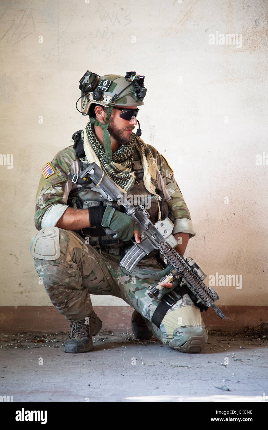 Portrait of american soldier resting from military operation Stock ...