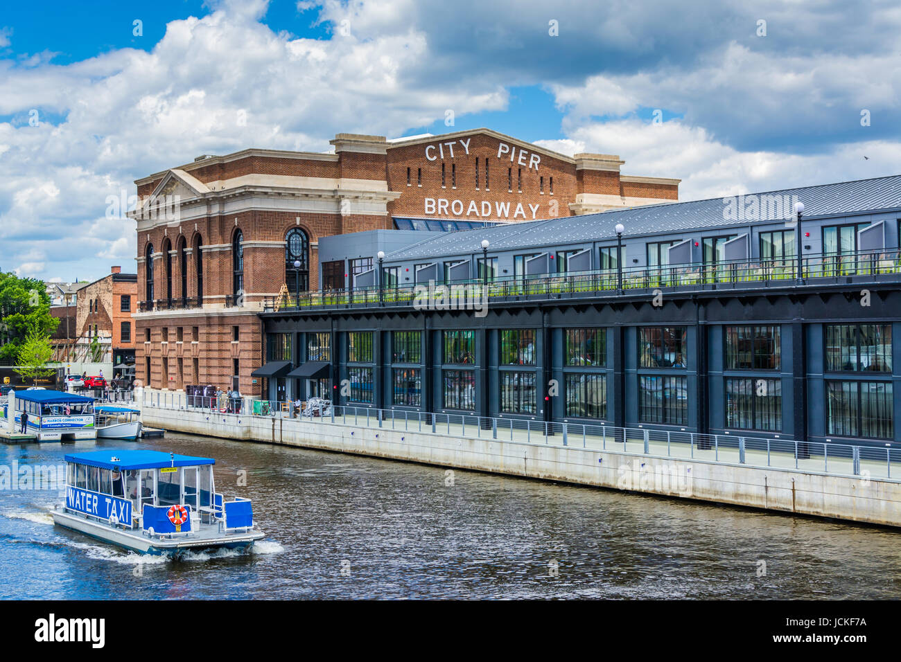 A water taxi and the historic Recreation Pier in Fells Point, Baltimore ...