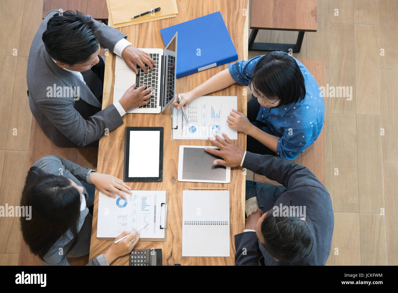 young business people and entrepreneur having a meeting around table in ...