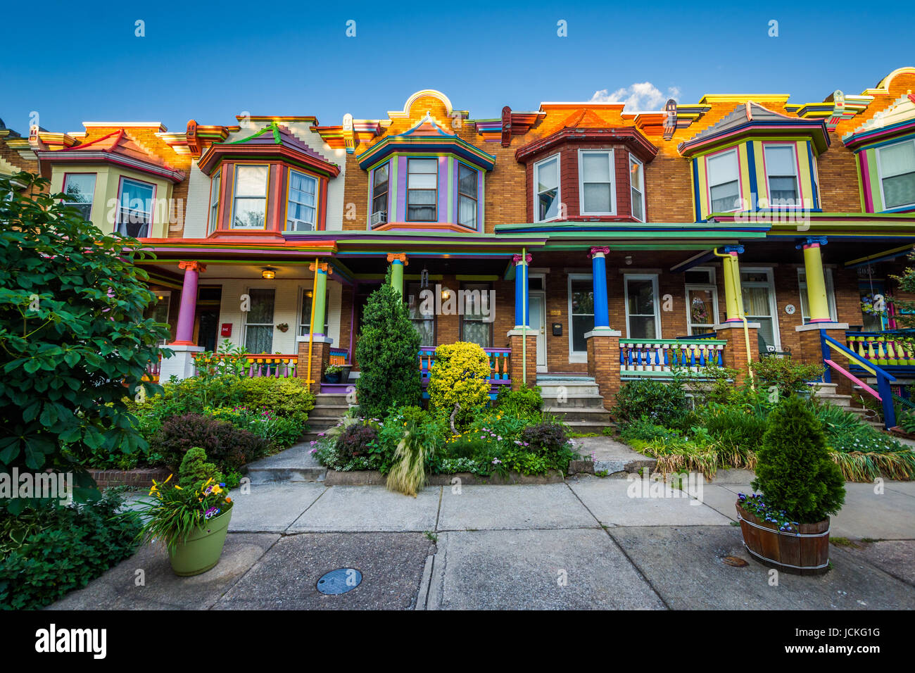 Colorful row houses on Guilford Avenue, in Charles Village, Baltimore ...