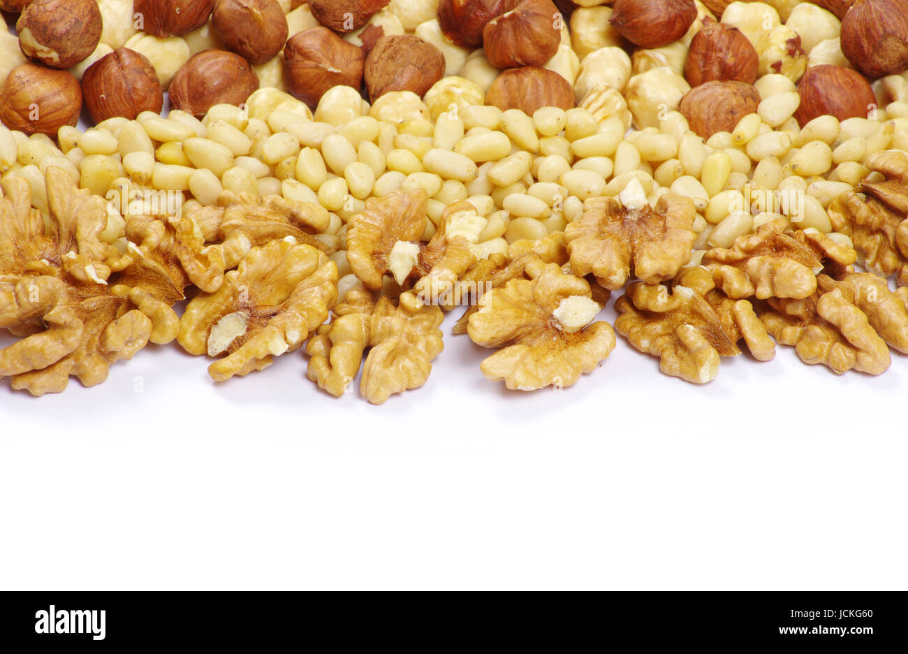 various nuts on white background Stock Photo - Alamy