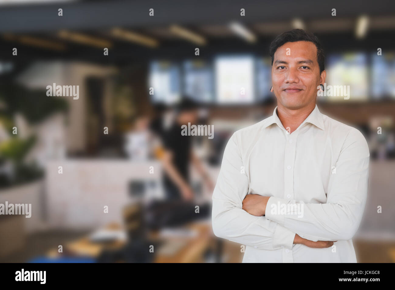 Successful small business owner standing at his cafe coffee shop. young ...