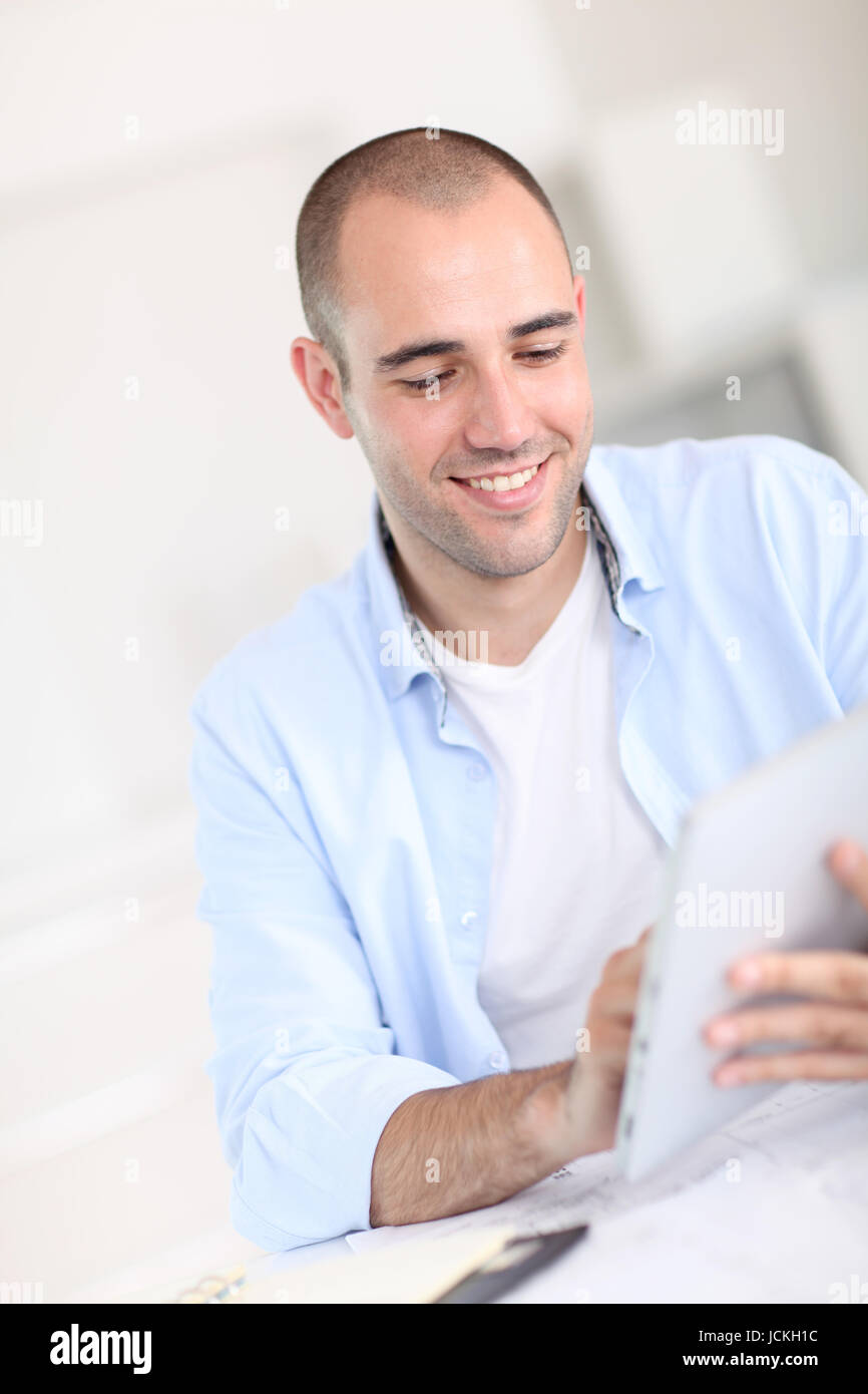Office worker using electronic tablet Stock Photo - Alamy