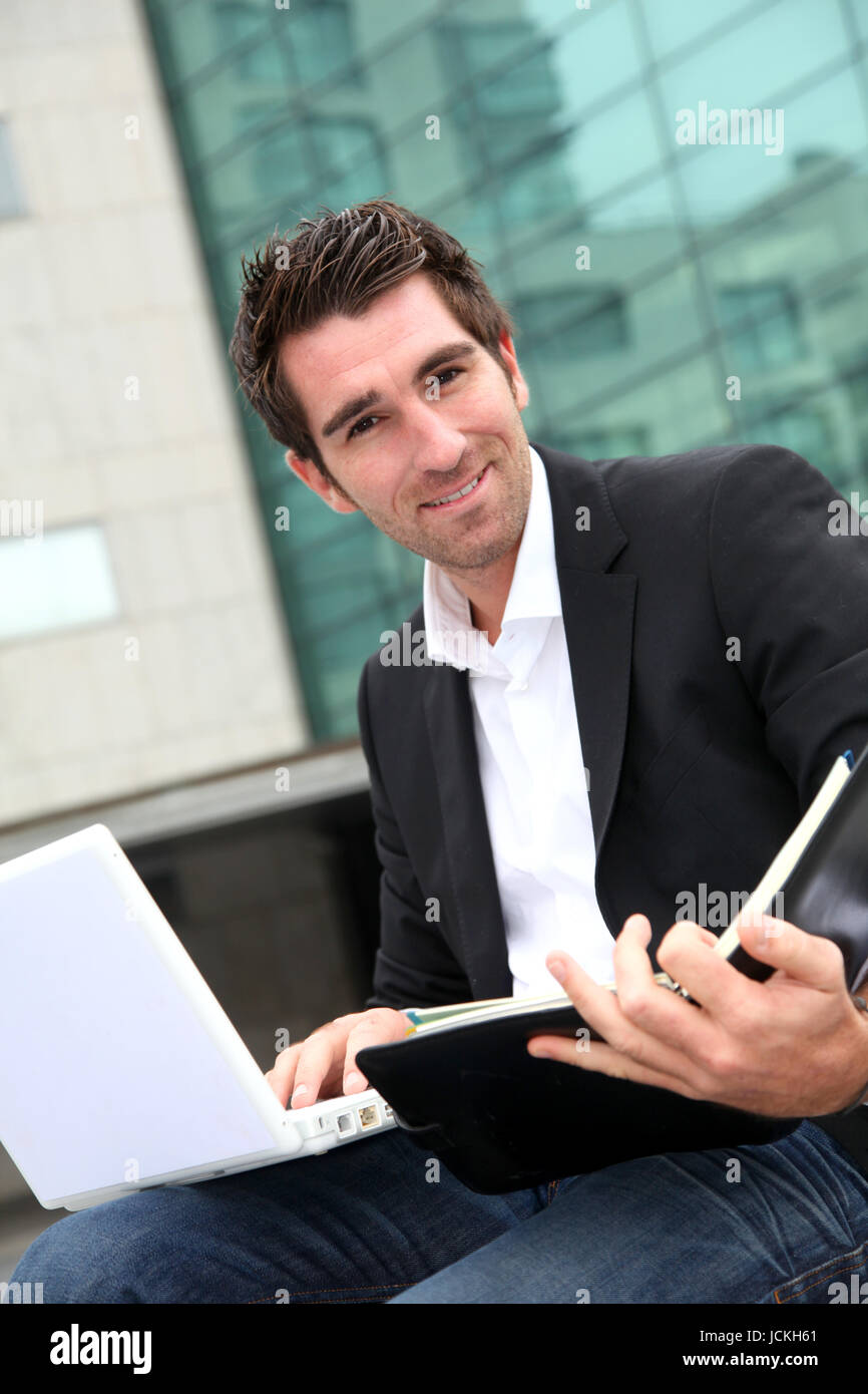 Salesman working outside building hi-res stock photography and images ...