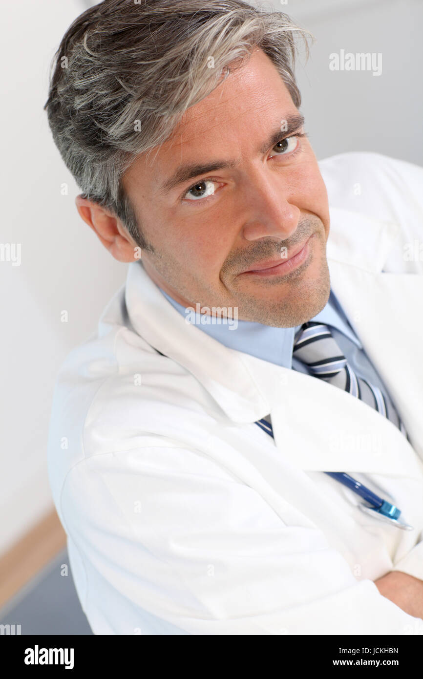 Portrait of handsome doctor Stock Photo - Alamy