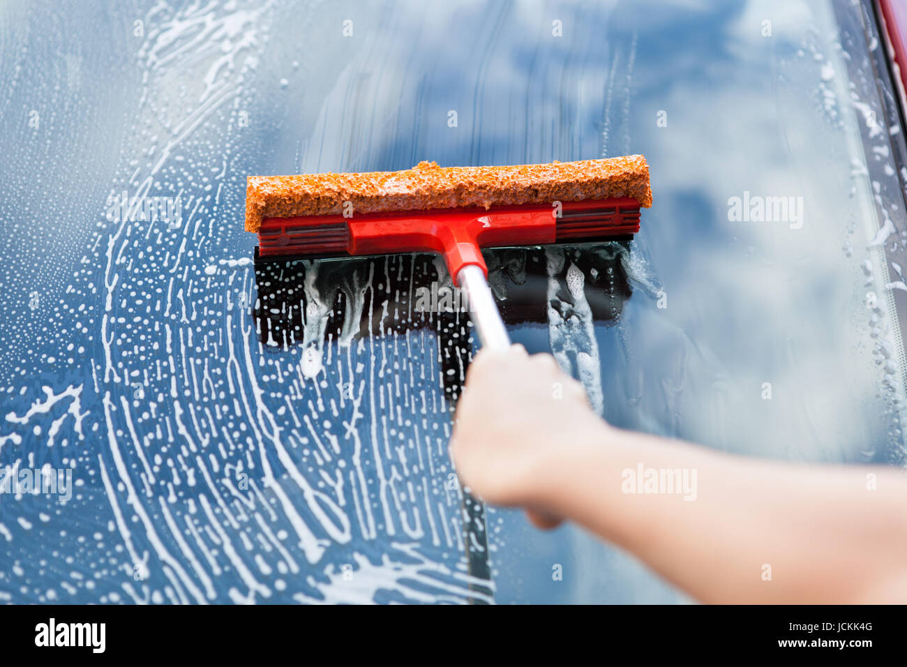 Close-up Of Hand Washing Car Window With Mop Stock Photo - Alamy