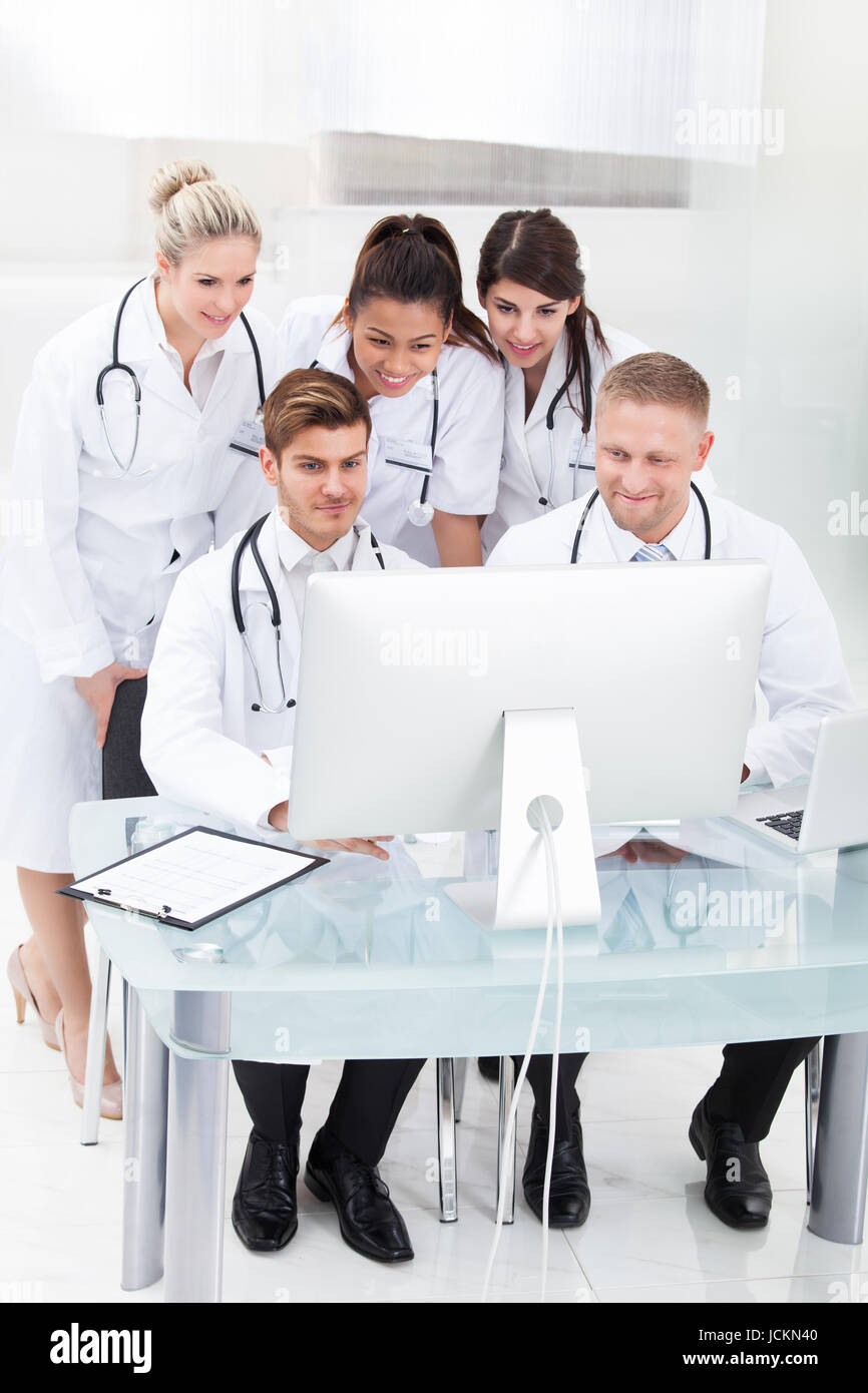 Diverse male female doctors using hi-res stock photography and images ...