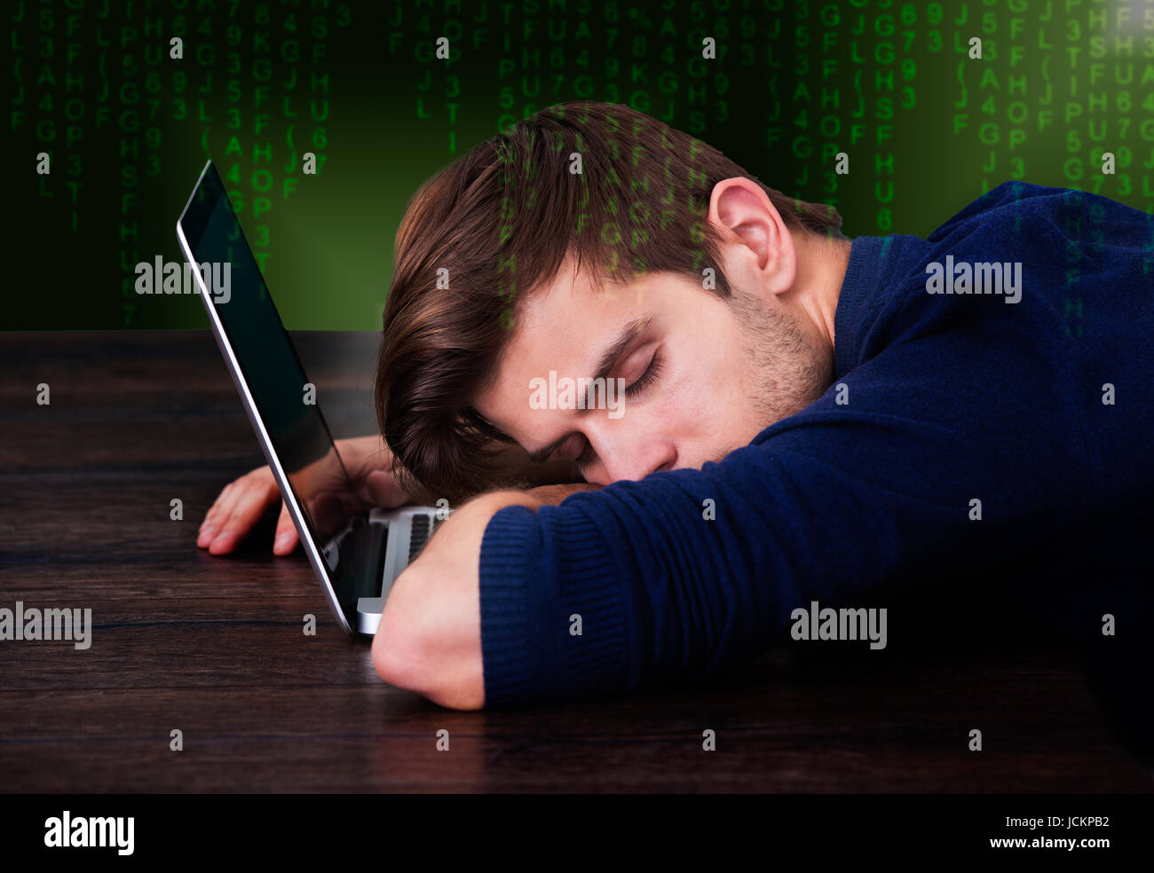 Digital composite image of young man sleeping on laptop at desk Stock ...