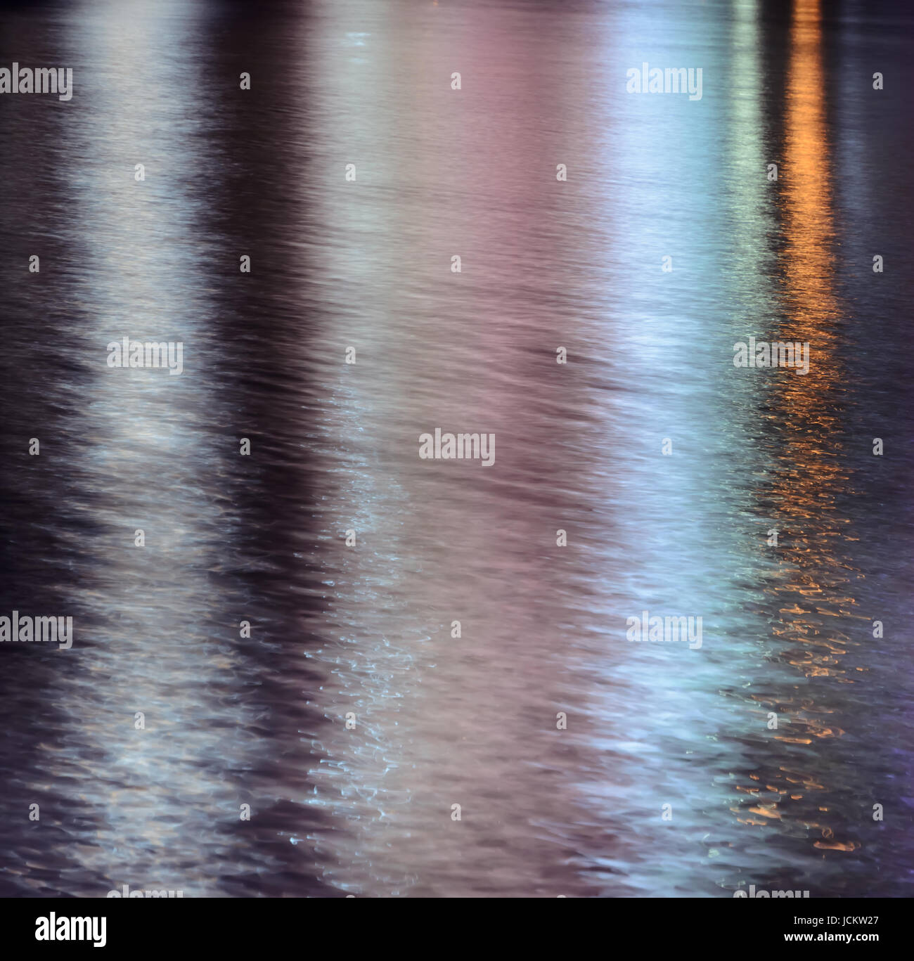 Colorful lights reflection on the water Stock Photo - Alamy