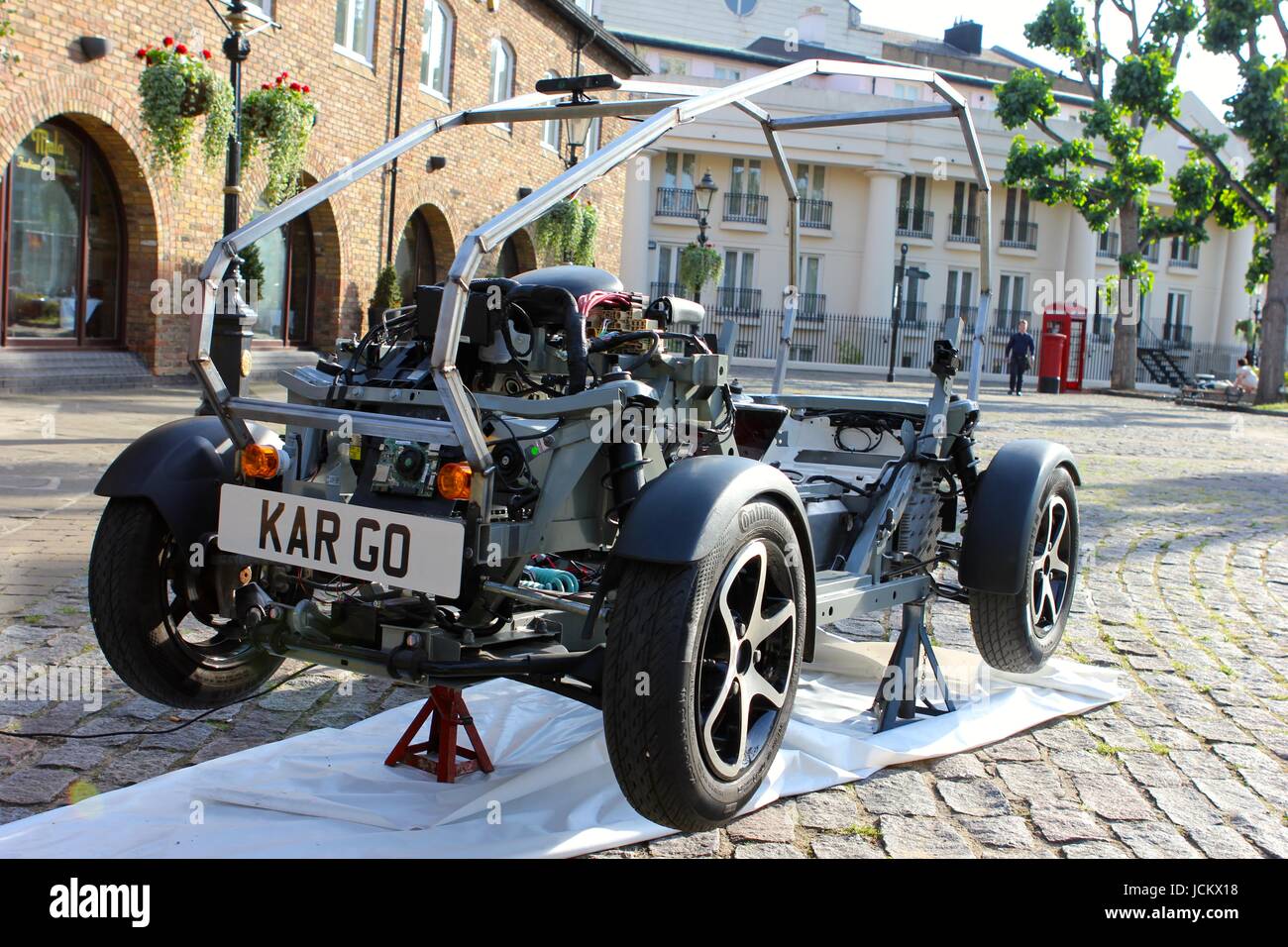 he kar - go launch first ever robotic driver free delivery car Stock ...