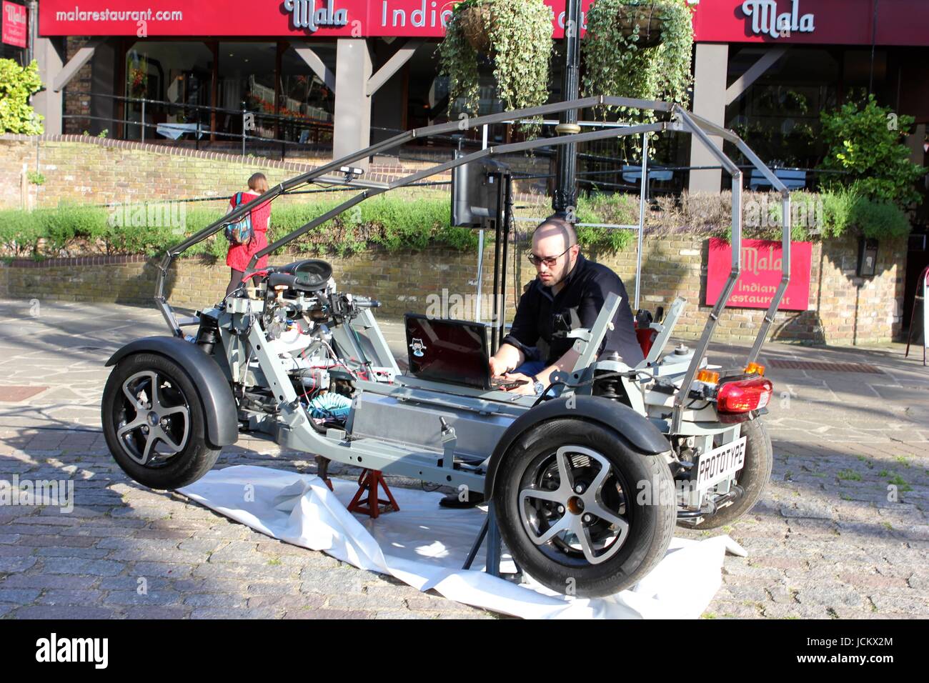 he kar - go launch first ever robotic driver free delivery car Stock ...