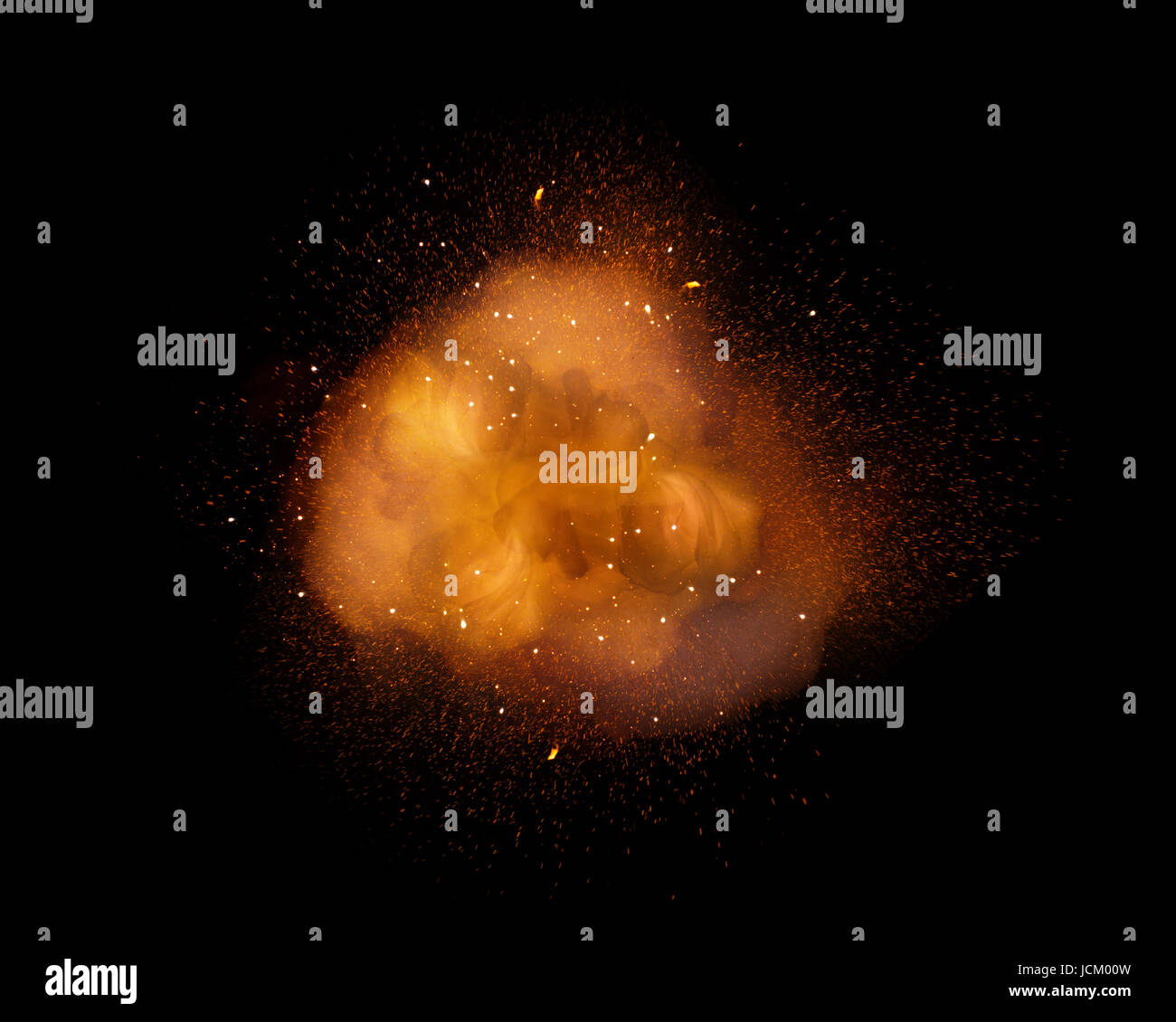 Huge, extremely hot explosion with sparks and hot smoke, against black ...