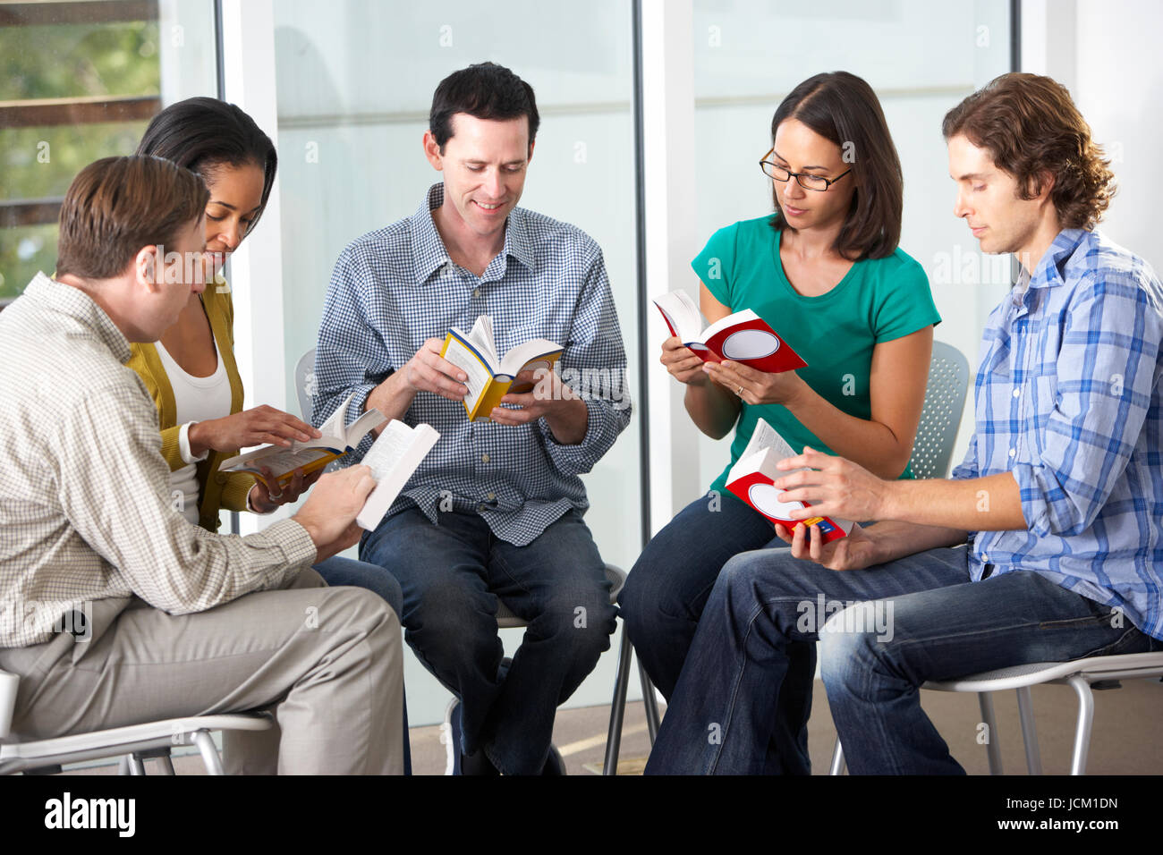 Bible Group Reading Together Stock Photo - Alamy