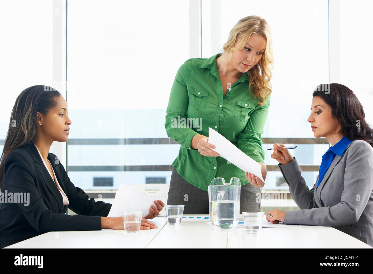 Group Of Women Meeting In Office Stock Photo - Alamy