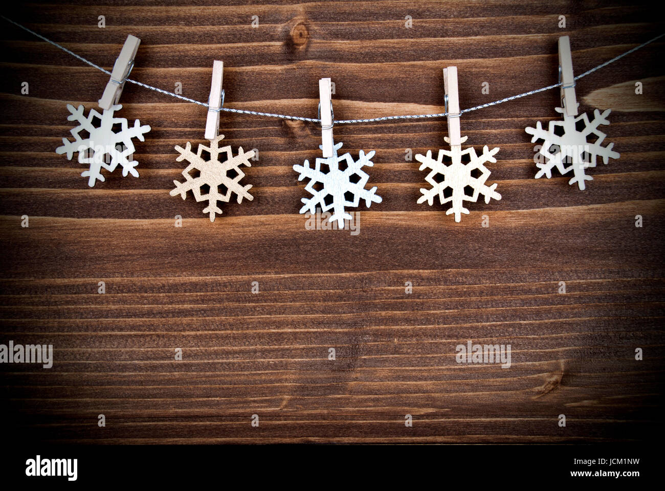 Snowflakes Hanging on a Line as Winter or Christmas Background with ...