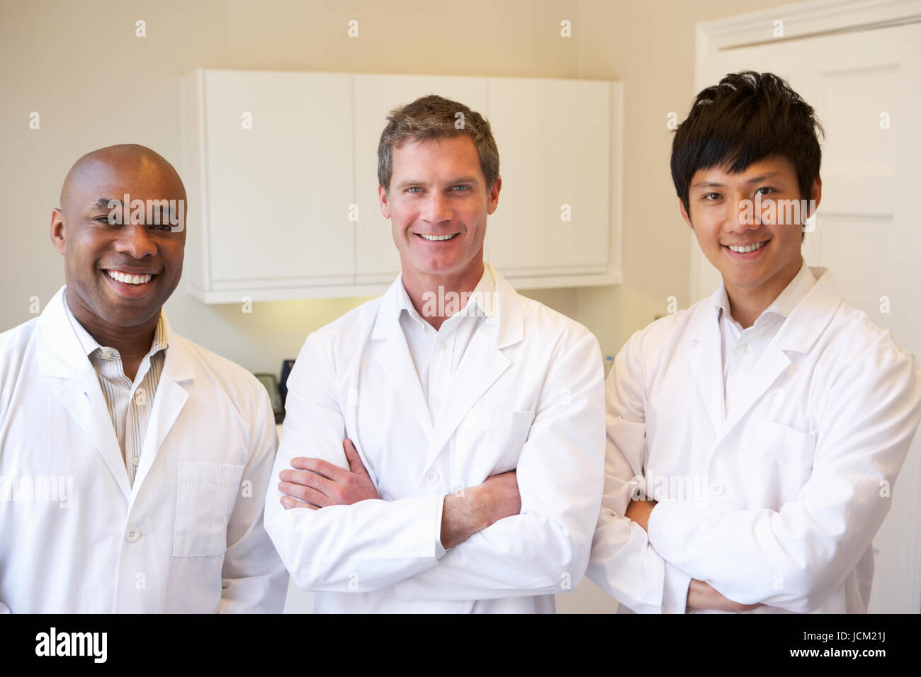Happy doctors men medicine science hi-res stock photography and images ...
