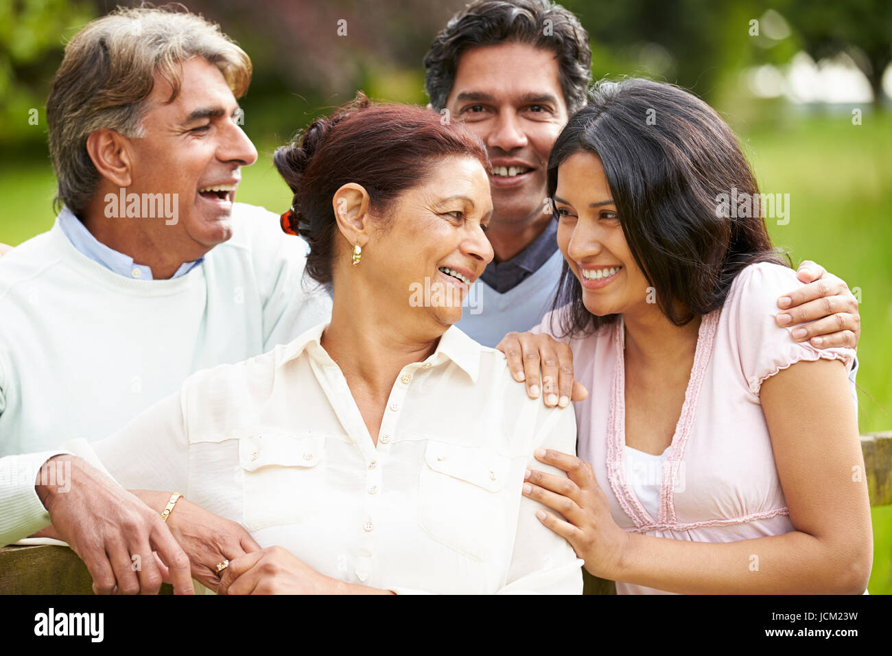 Indian Family Walking In Countryside Stock Photo - Alamy