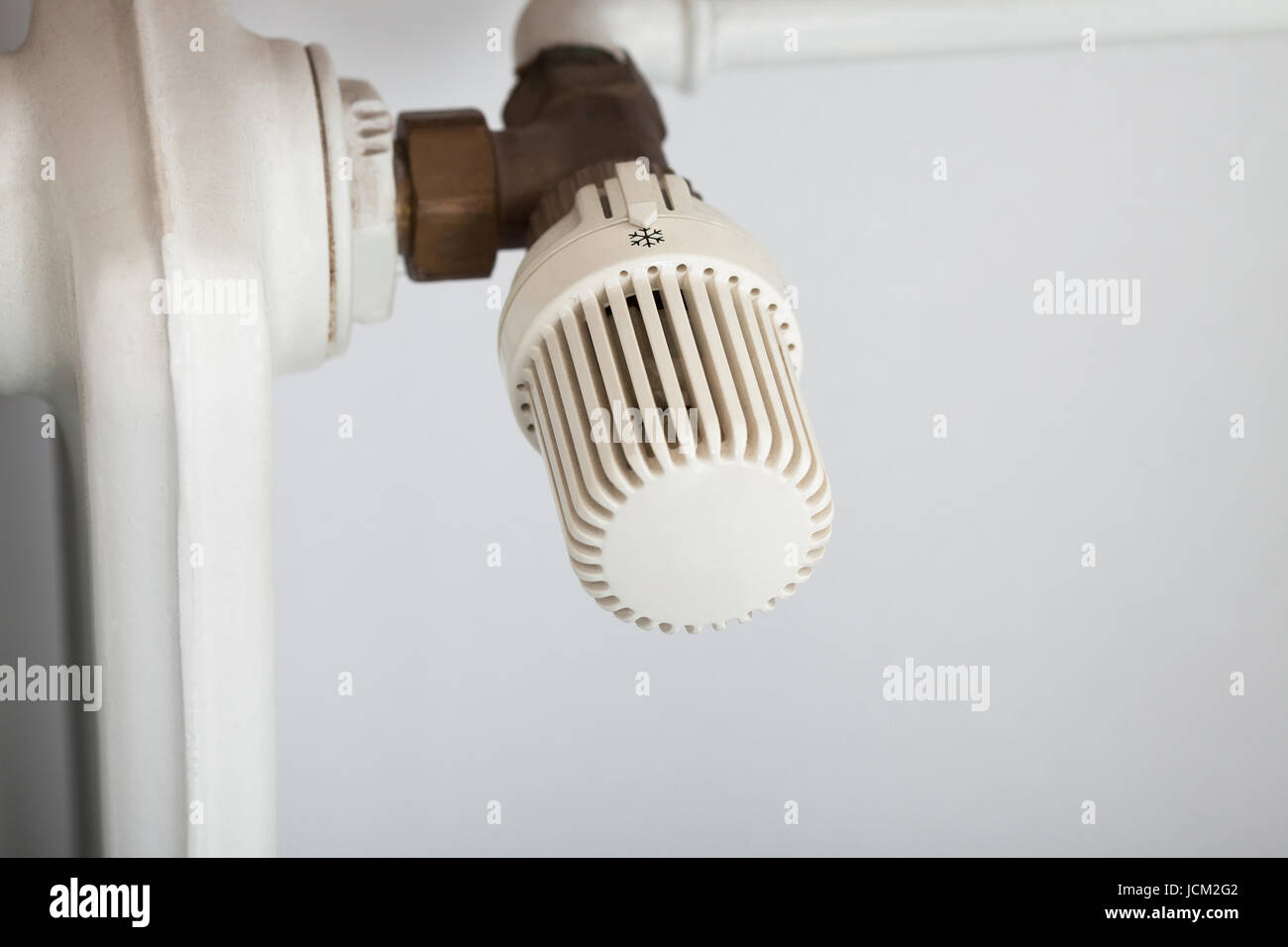 Closeup photo of temperature control on radiator Stock Photo - Alamy