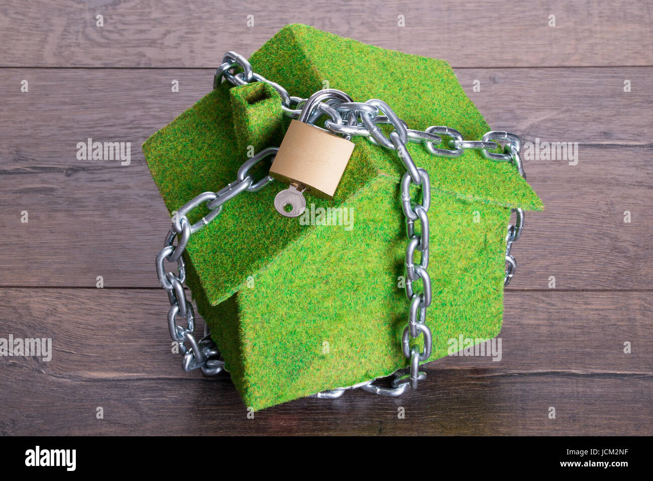 Photo of chained house for security concept Stock Photo - Alamy