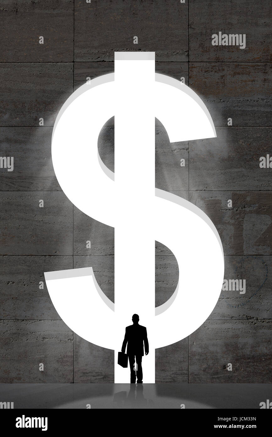Silhouette businessman standing in front of large dollar sign in wall ...