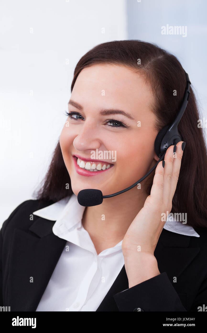 Portrait of beautiful customer service representative in office Stock ...