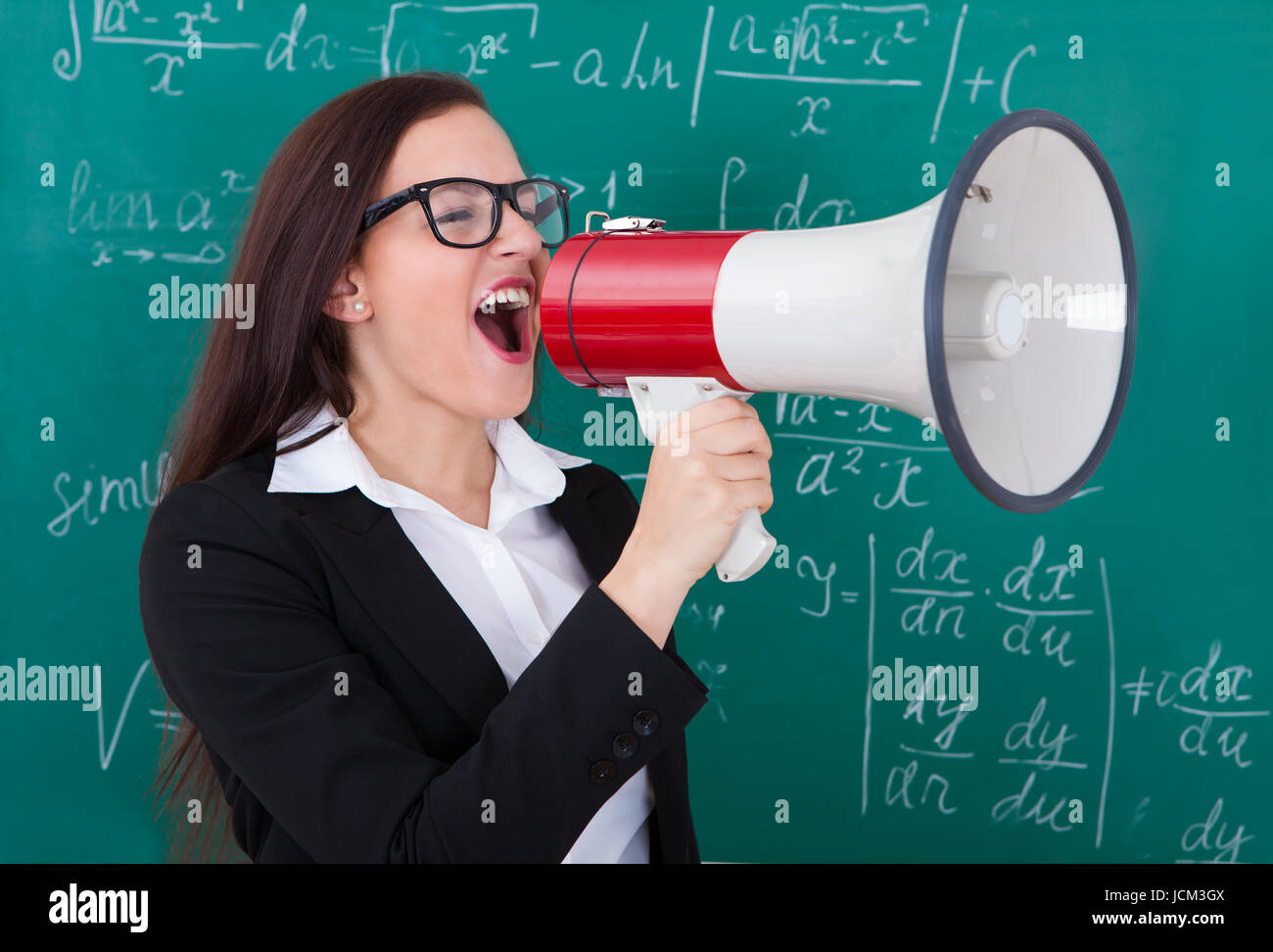 Angry teacher woman megaphone shouting hi-res stock photography and ...