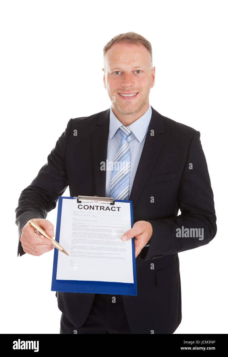 Standing holding signing paperwork document hi-res stock photography ...