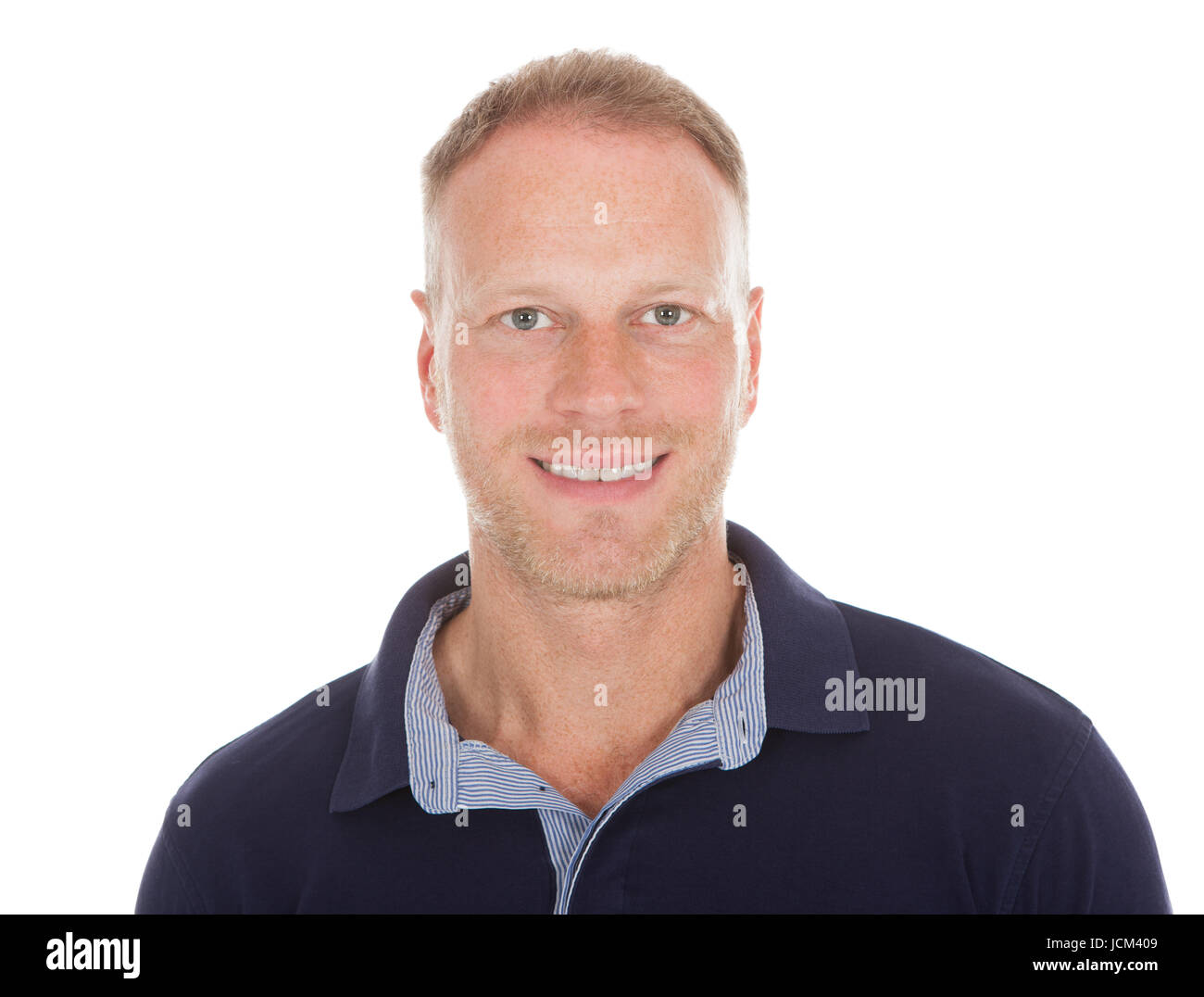 Full length of handsome mid adult man in casuals over white background ...