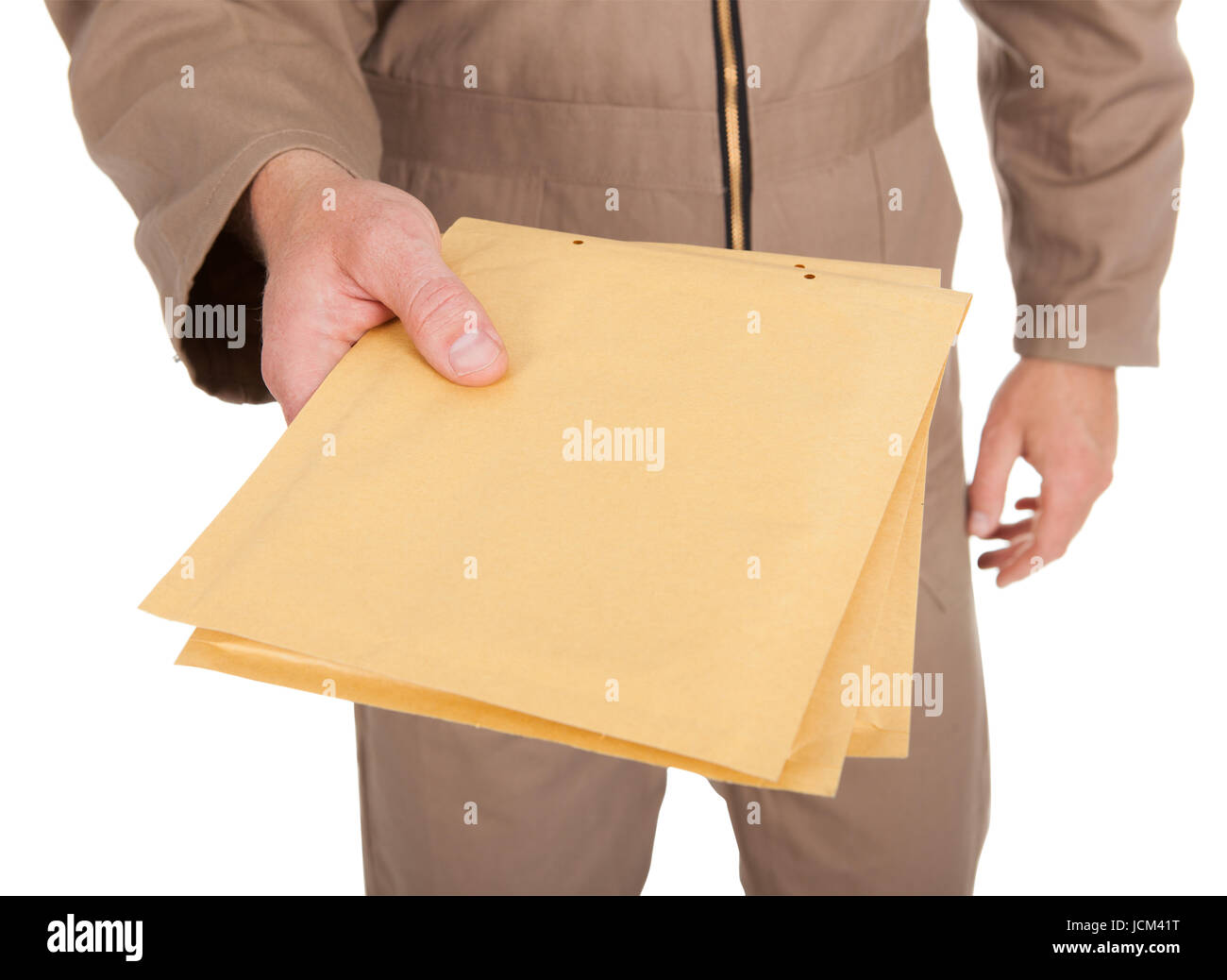 Midsection of postman holding envelopes over white background Stock ...