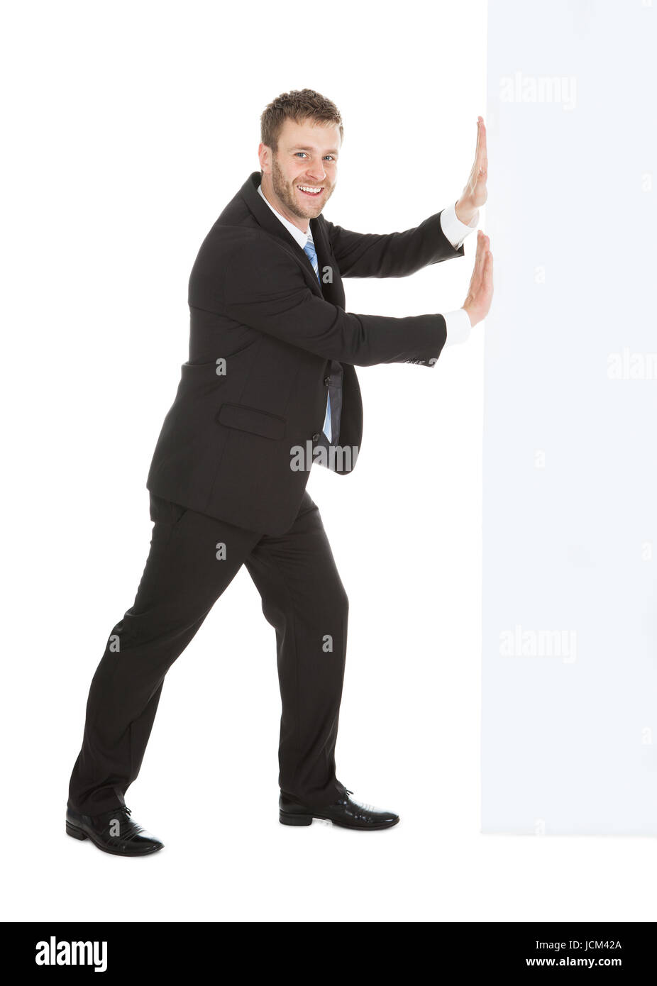 Corporate man pushing cutout hi-res stock photography and images - Alamy